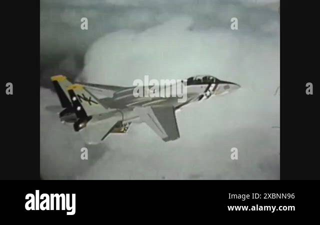 1974 - A Grumman F-14 Tomcat warplane fires an AIM-54 Phoenix missile ...