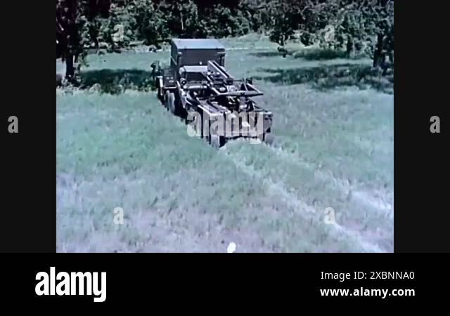 1965 - Soldiers set up a launching station using a hydraulic jack and ...