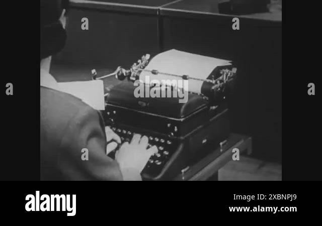 1944 - An office worker protects the platen by using manila paper as a ...