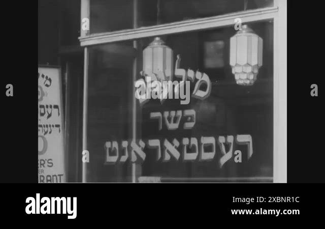 1939 - Signs for various Jewish American businesses including a ...