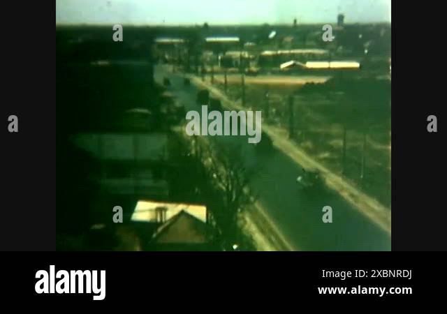 1918 - Soldiers wearing gas masks load and fire artillery, a soldier ...