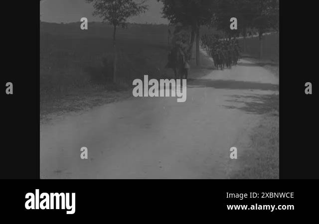 1918 - Mounted soldiers, marching troops, mule-drawn wagons and trucks ...