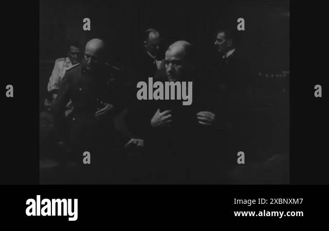 1938 - Prime Minister Benito Mussolini waves to celebratory crowds and ...