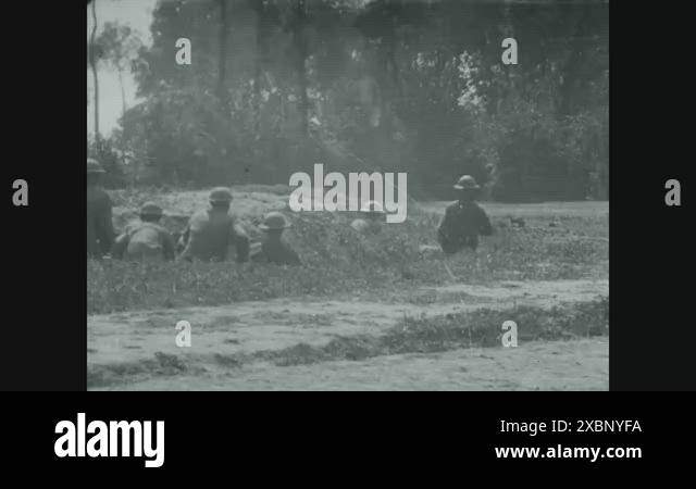 1918 - Soldiers practice throwing hand grenades in trenches, and ...