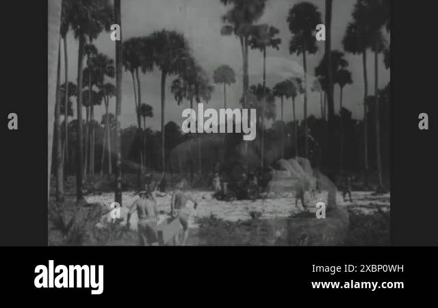 1944 - Warplanes and warships bomb an enemy dispersal strip in a jungle ...