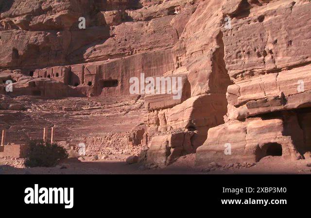 Pan across the ancient amphitheater in the ancient Nabatean ruins of ...
