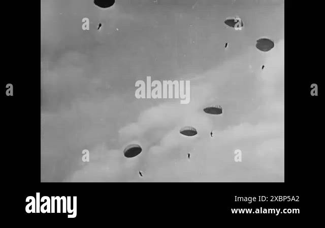 Paratroopers train on an obstacle course, using a dummy plane and ...