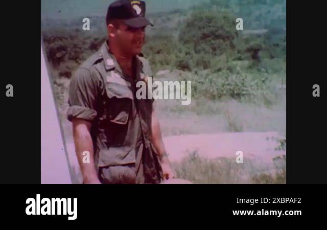 Replacement troops listen to a captain explain preparatory training, at ...