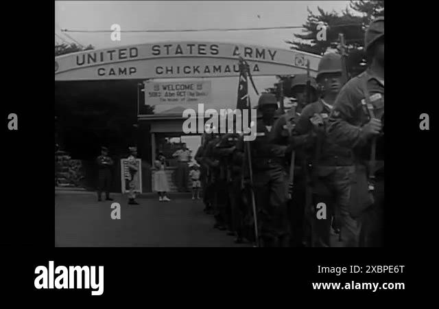 American soldiers parade at their arrival to a Japanese camp for a ...