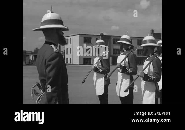 Canadian military Pioneers, troops marching using a pacing stick and ...