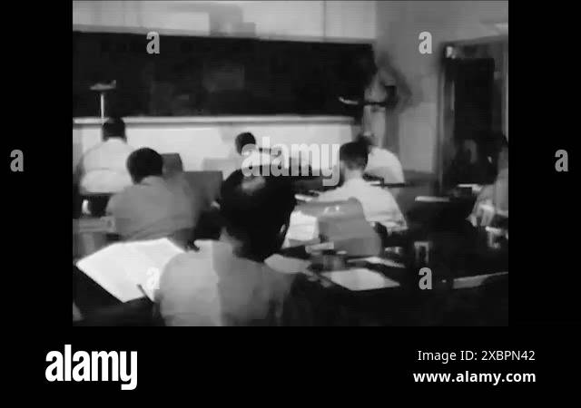 Astronauts learn in an Air Force Base classroom and dress in space ...