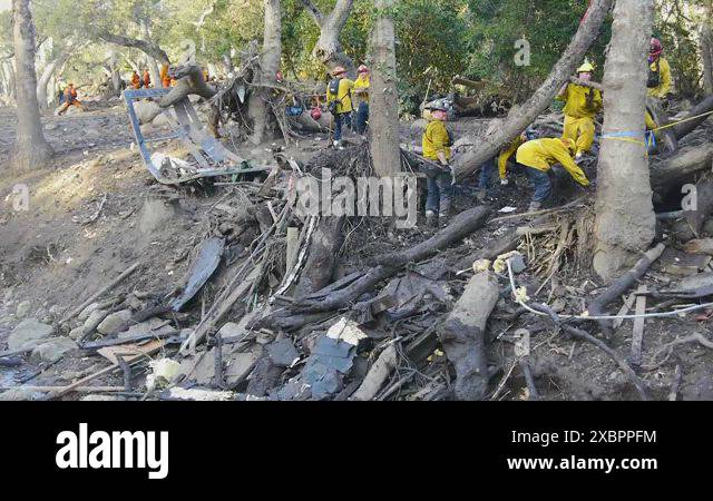 2018 - search and rescue crew with cadaver dog inspect damage from the ...