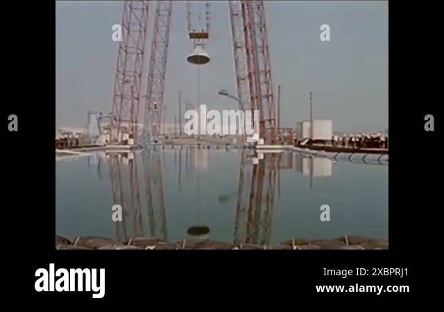 Splashdown tests for the Apollo spacecraft at an outdoor pool and a ...