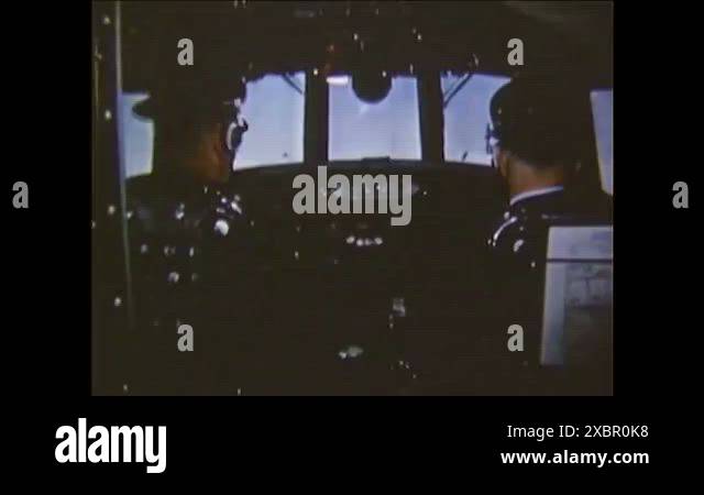 Arthur Godfrey smokes cigarettes in the cockpit with the [pilots of the ...