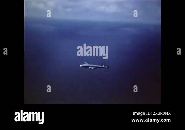 Arthur Godfrey smokes cigarettes in the cockpit with the [pilots of the ...