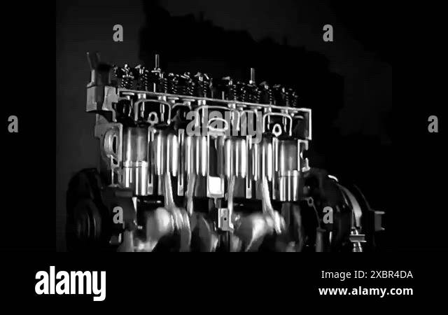 A view inside a working engine is shown, men in a foundry put a flange ...