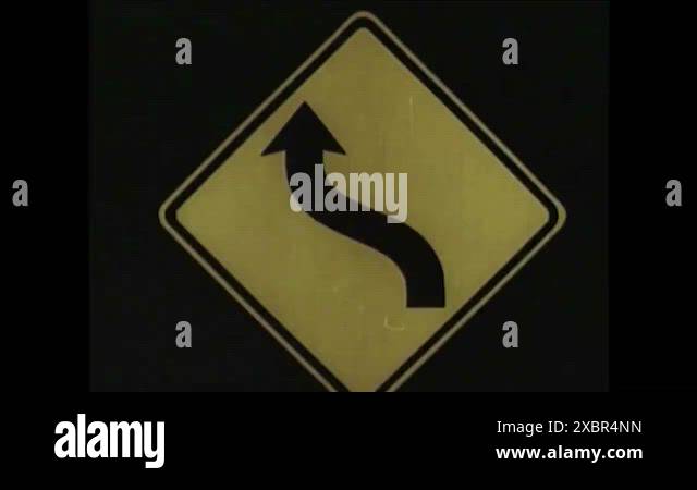 Various animated road signs and driving conditions are shown and a ...