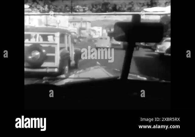 Pedestrians walk in blind spots, exit a car on the curbside, and walk ...