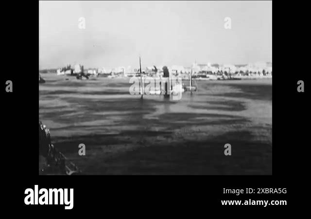 Navy Seabees deploy portable docks during the invasion of Sicily during ...