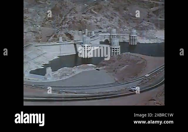 Hoover Dam, operating at full hydroelectric capacity, with turbines and ...