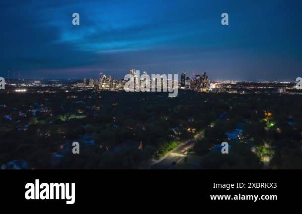 Hyperlapse shifts from twilight to night in Austin, texas. City lights ...