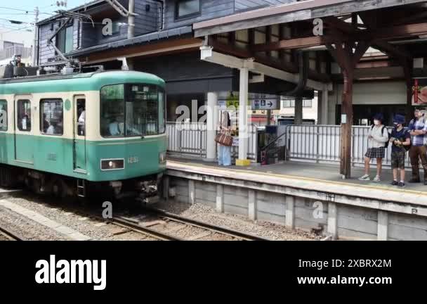 Kamakura, Japan- 14 May, 2024: Enoshima Electric Railway train ...