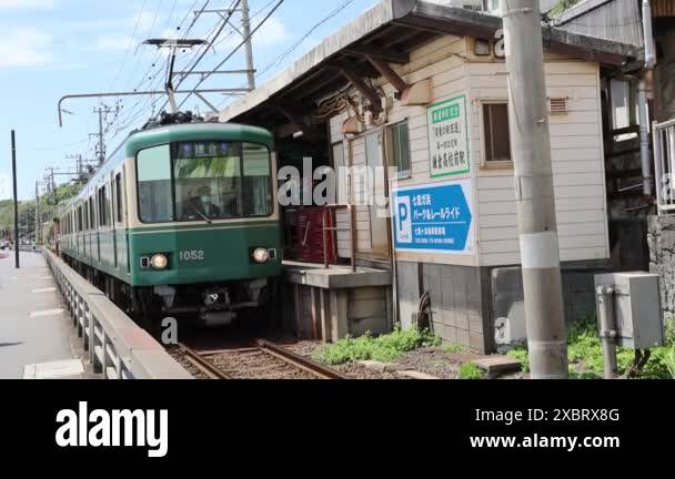 Kamakura, Japan- 14 May, 2024: Enoshima Dentetsu train Line in Kamakura ...