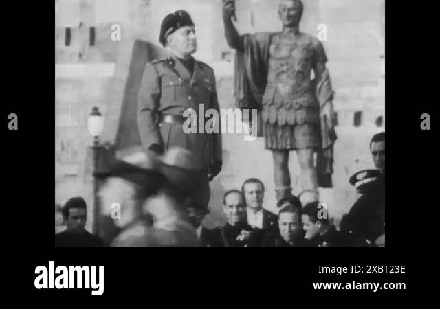 Mussolini is surrounded by fascist military members in the 1940s during the WWII Stock Video ...