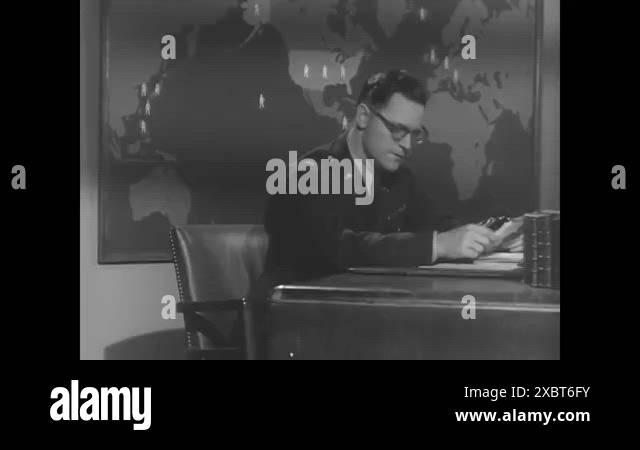 A sergeant talks about the Walter Reed Army Medical Office at his desk ...