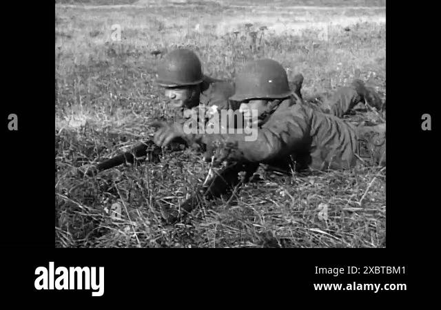A group of Eskimo men practice their map reading skills to become ...