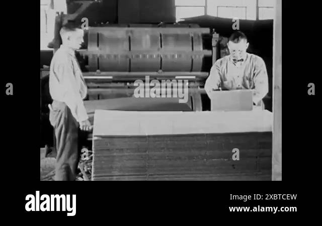 Box blanks are formed using huge presses at a paper mill in the 1920s ...