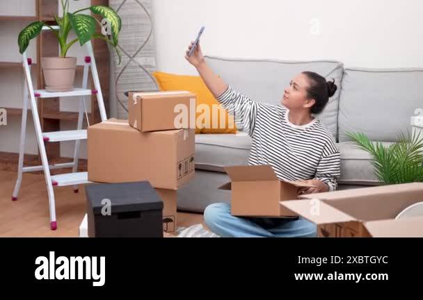 Relocation Reimagined: A young woman unboxes, showcases her new home on ...
