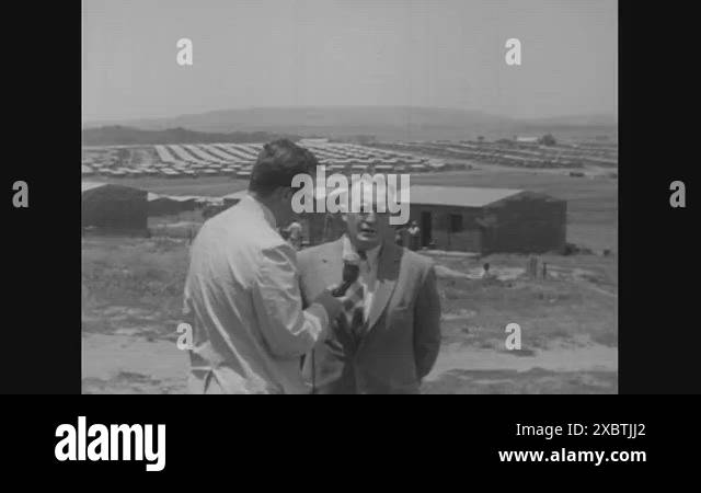 A man interviews a black South African intellectual about apartheid in ...