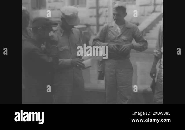 American soldiers interact with Japanese people during the Allied ...