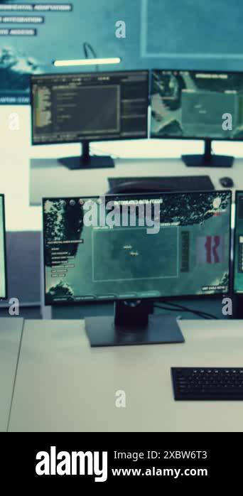 Vertical Video Federal agency command center equipped with surveillance ...