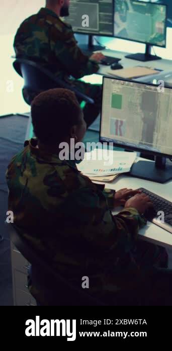Vertical Video Army officer establishing new operating bases through a world map satellite ...