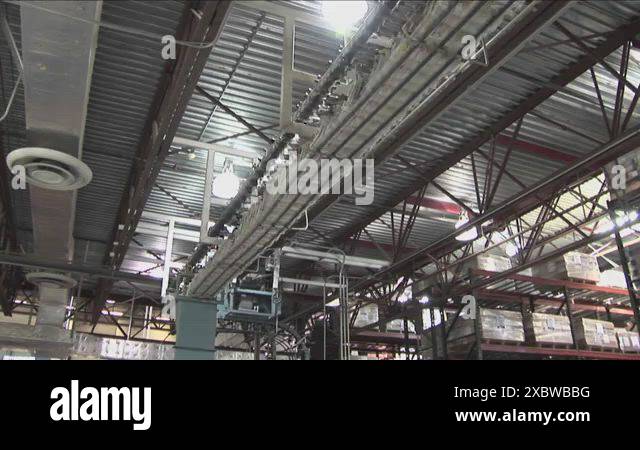 Newspapers flow along an assembly line in a newspaper factory Stock ...