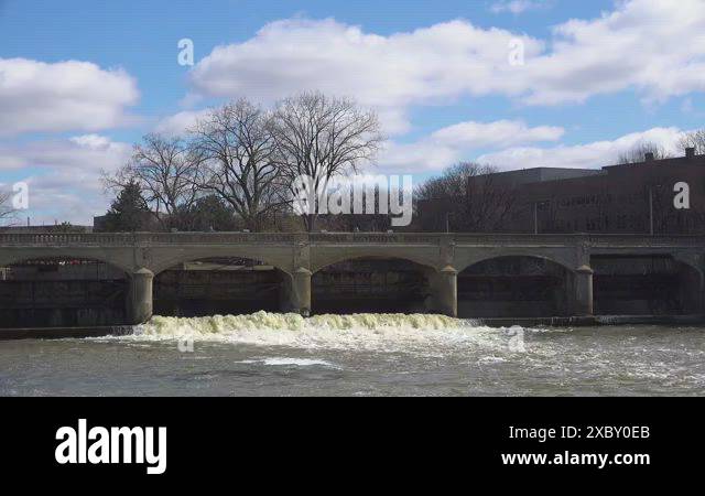 Polluted water flows from the Flint River through Flint, Michigan ...