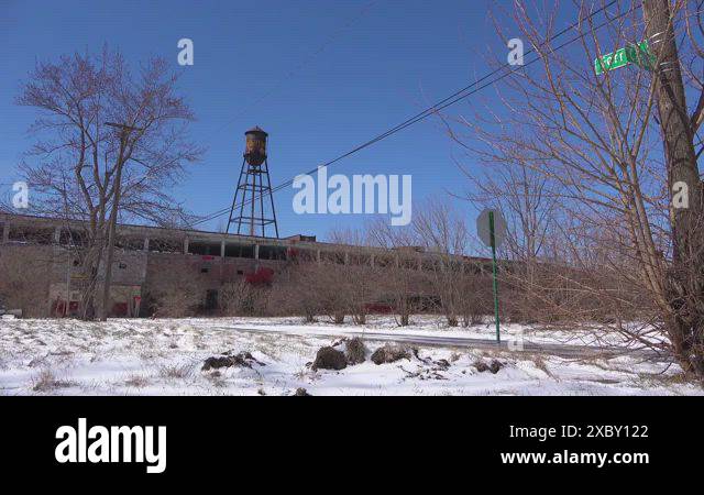 Old abandoned houses and abandoned factories in a ghetto section of ...
