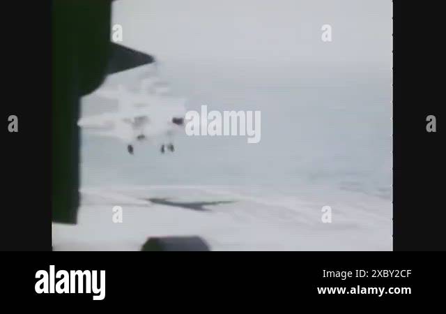 1970 - A US Navy A-7B plane skids overboard on the flight deck of the ...