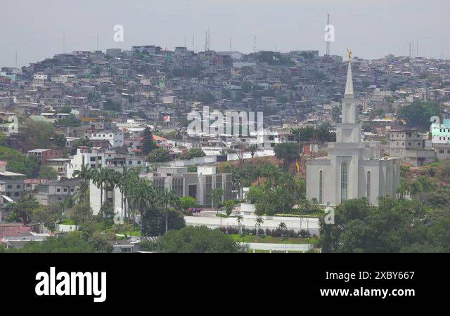 Establishing shot of the city of Guayaquil, Ecuador with Mormon church ...