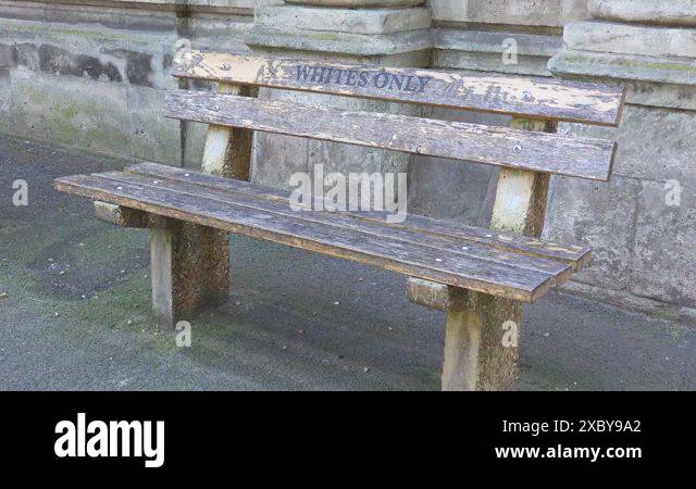 A bench sayings whites only along a street in Cape Town, South Africa ...