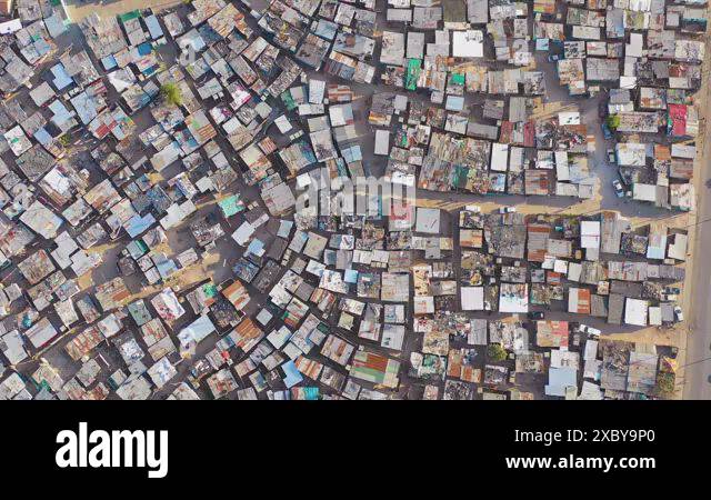 Straight down high aerial over ramshackle township of Gugulethu, one of ...