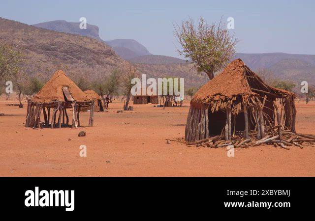 Small poor African Himba rural village on the Namibia Angola border ...