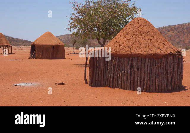 Small poor African Himba rural village on the Namibia Angola border ...