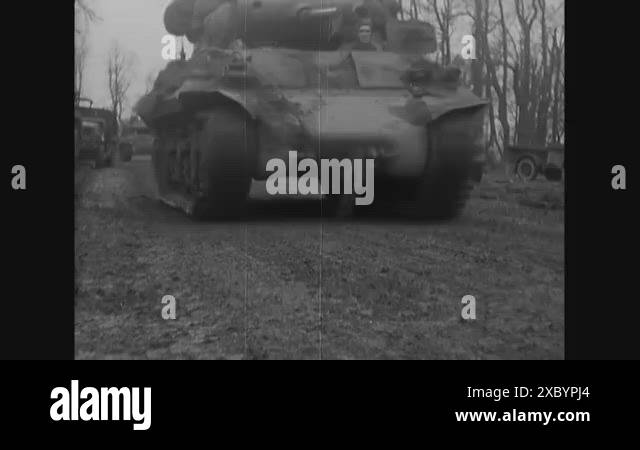 1945 - M-4 tanks and half-tracks of the 2nd Armored Division move ...