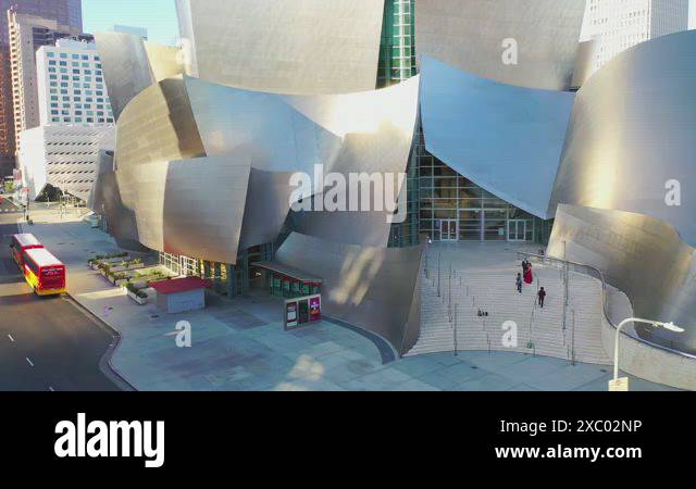 Beautiful rising aerial of the Walt Disney Concert Hall in downtown Los ...