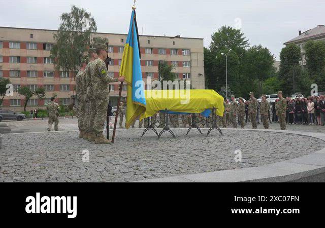 2022 - a military funeral procession and funeral takes place at a ...