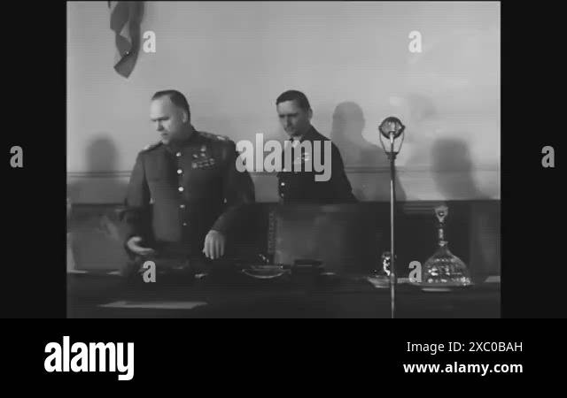 1945 - Soviet Marshal Zhukov and Nazi Marshal Keitel sign documents ...