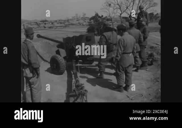 1951 - ROK artillerymen fire a 75mm anti-tank gun they captured from ...